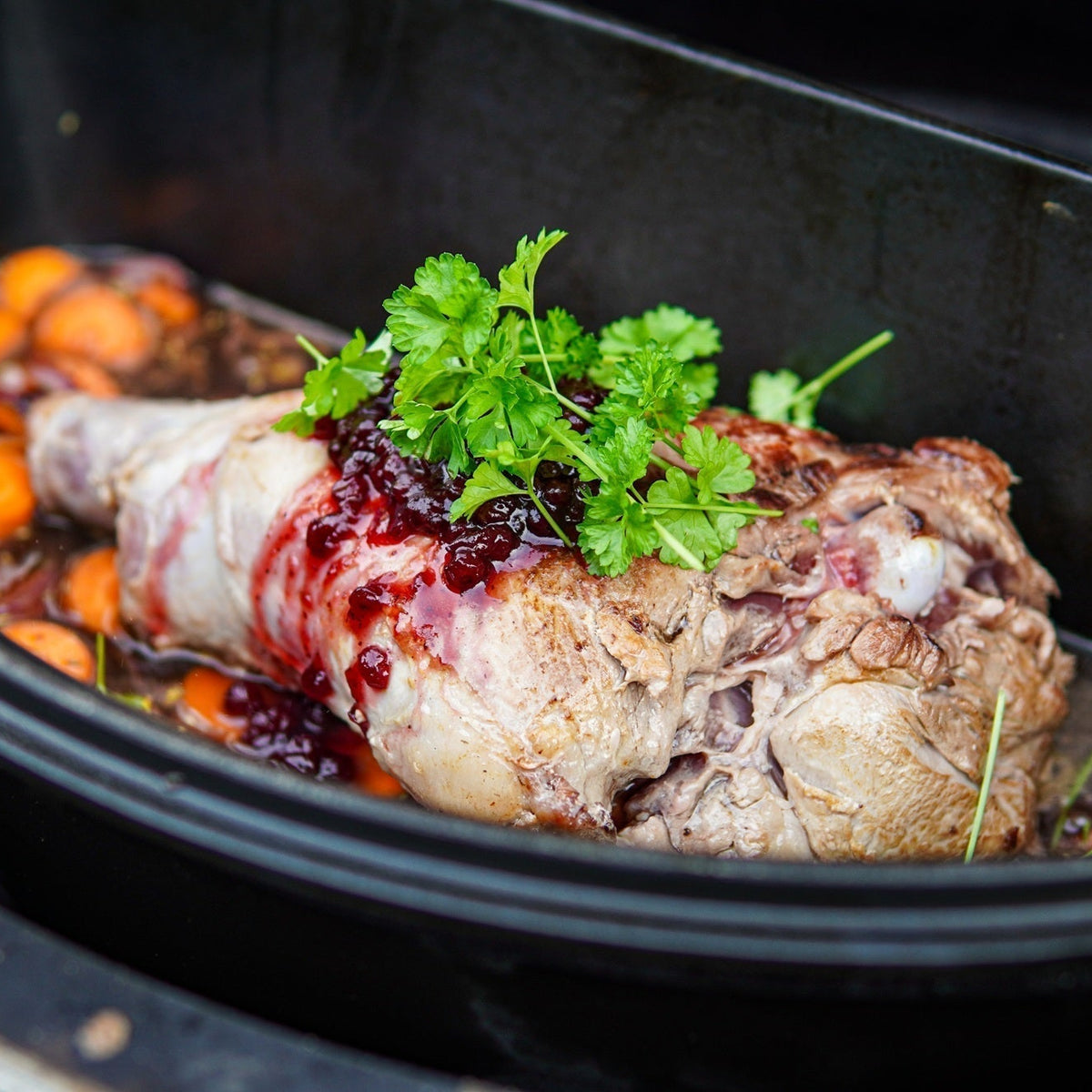 Wild boar leg with smashed dumplings
